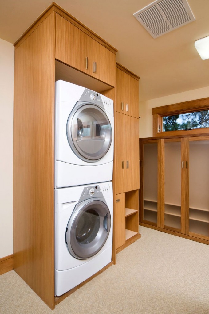 stacked machines minimalistic small laundry room designs