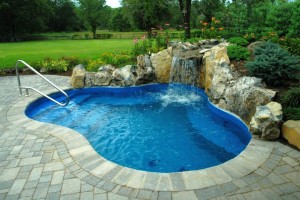 20 Exquisite Waterfalls Designs for Pools Inground